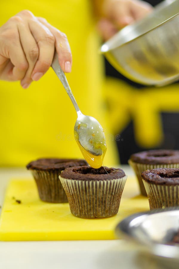 The Process of Making Chocolate Cupcakes with Sweet Cream. Creation of ...