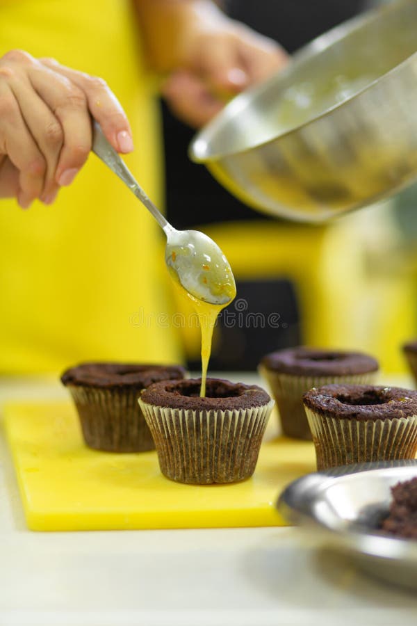 The Process of Making Chocolate Cupcakes with Sweet Cream. Creation of ...