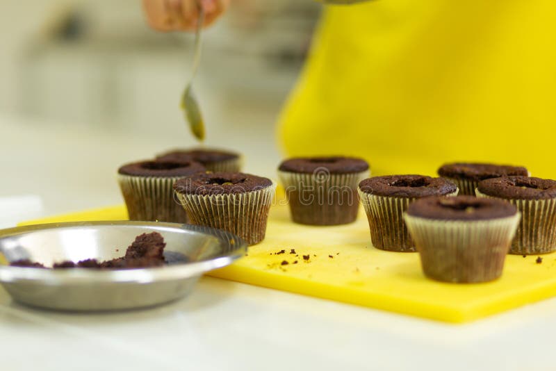 The Process of Making Chocolate Cupcakes with Sweet Cream. Creation of ...