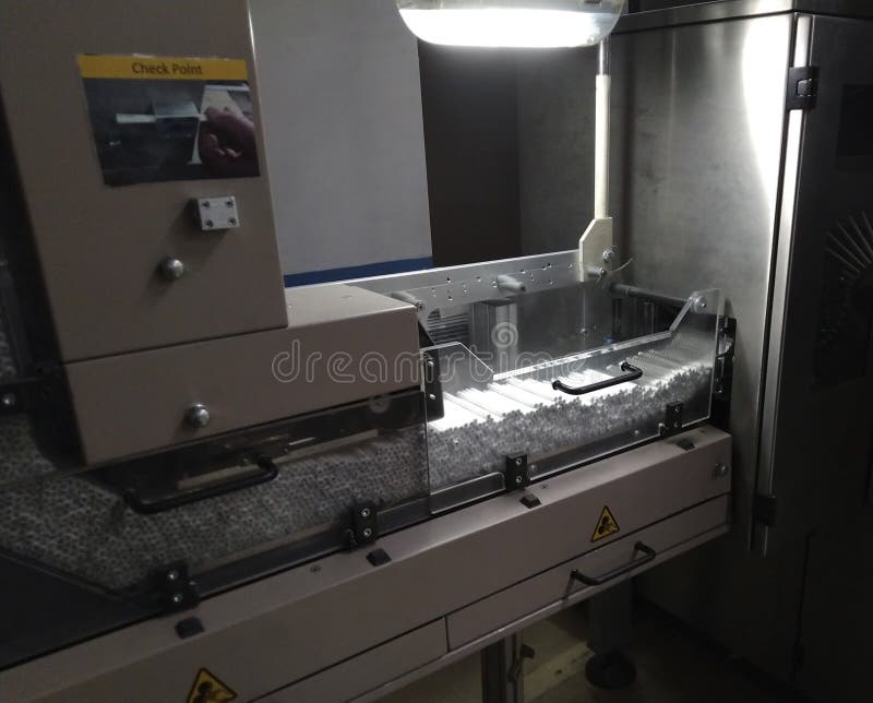 The Process of Making Cigarettes in a Tobacco Factory. Automated ...