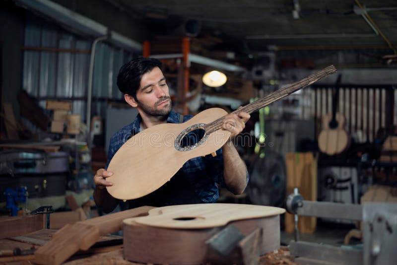 The Process of Making a Classical Guitar, Luthier Checking Guitar Stock ...