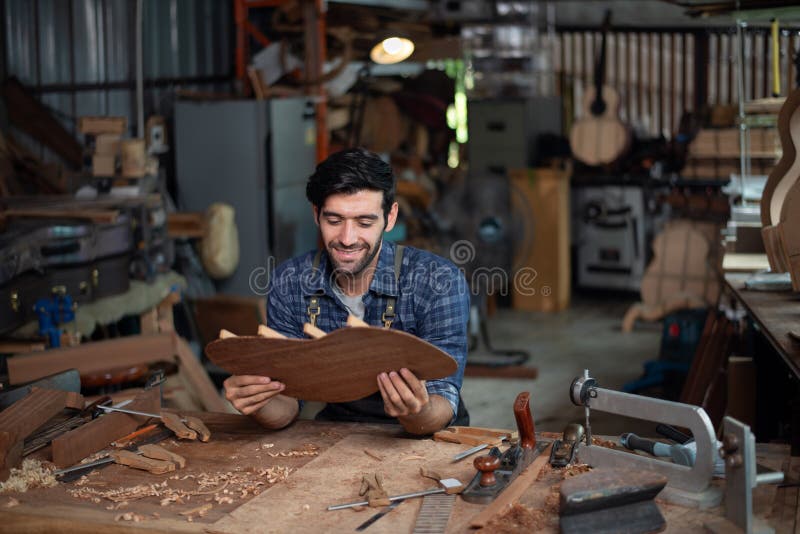 The Process of Making a Classical Guitar, Luthier Checking Guitar Stock ...