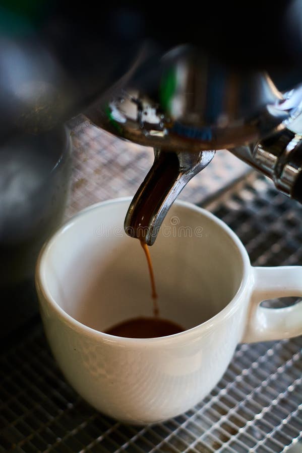 The Process of Making Coffee in White Ceramic Cup on Professional ...