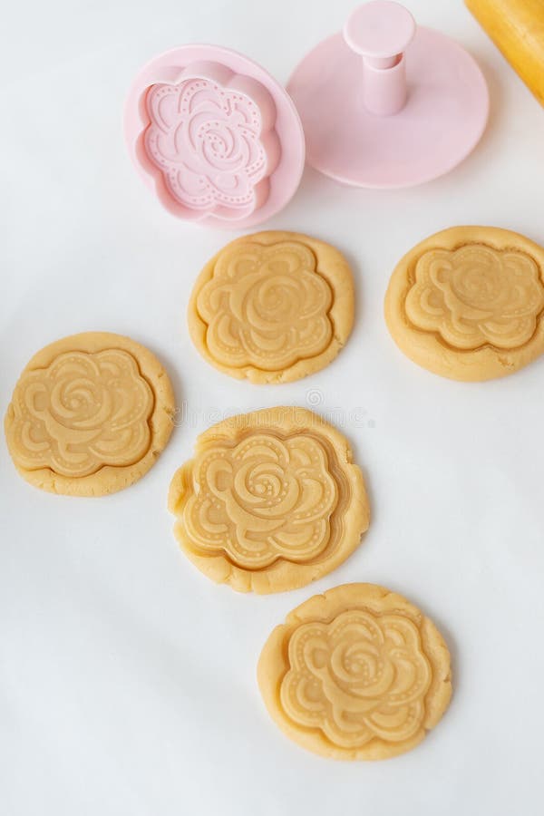 The Process of Making Cookies with Forms in the Form of Flowers, a ...