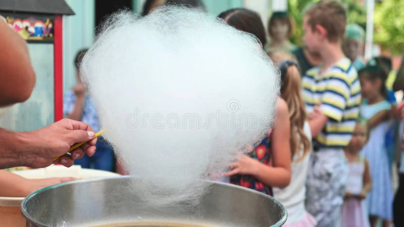 The Process of Making Cotton Candy Outdoors for Children. Stock Image ...