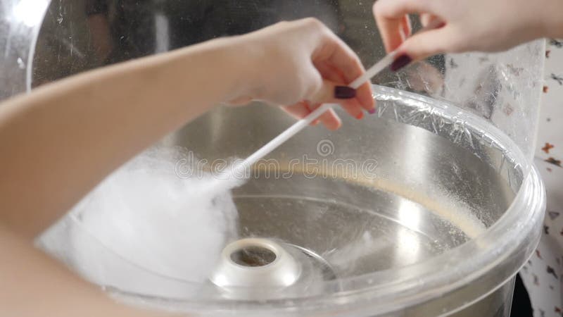 Process of Making of Cotton Candy in Slow Motion. Close-up on Machine ...