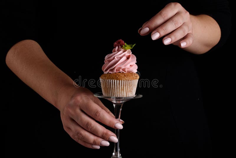 The Process of Making Cupcakes, Coating a Cream from a Pastry Bag in ...