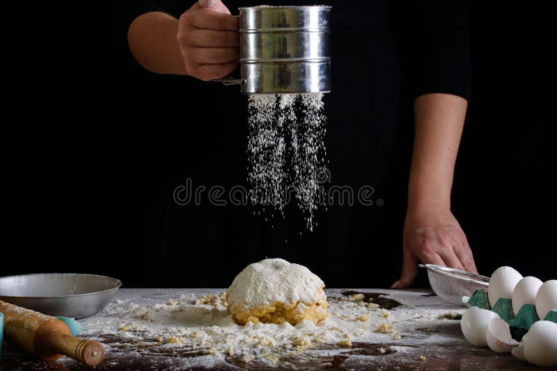 The Process of Making Cupcakes, Coating a Cream from a Pastry Bag in ...