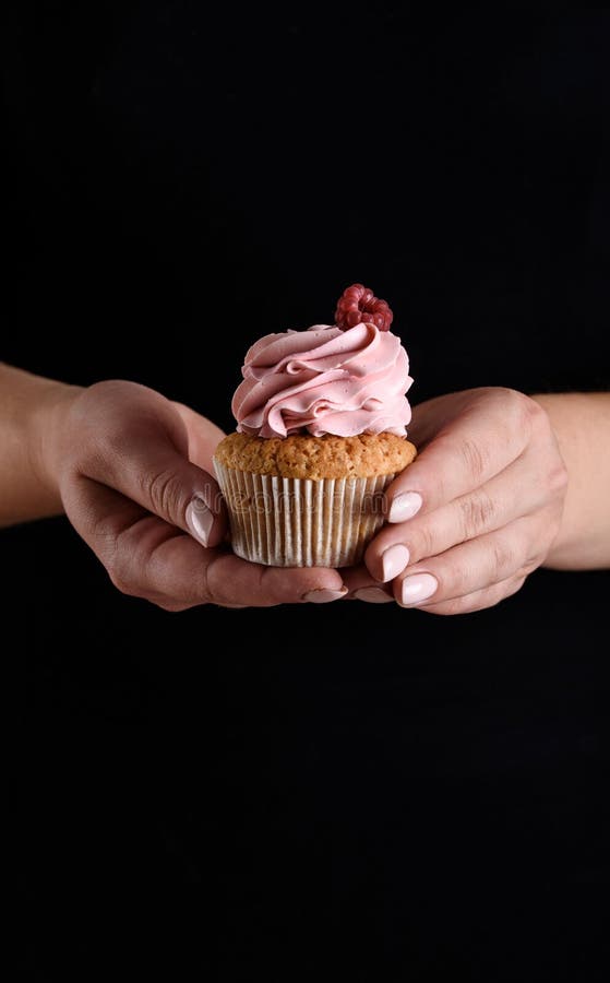 The Process of Making Cupcakes, Coating a Cream from a Pastry Bag in ...