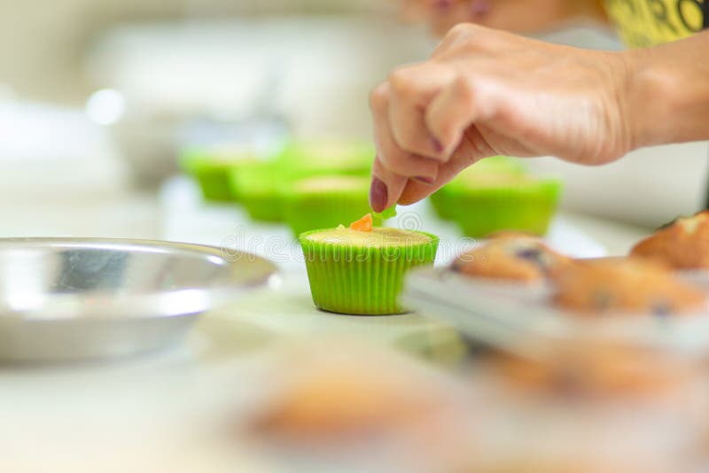 The Process of Making Cupcakes. Creation of Cakes by Professional ...