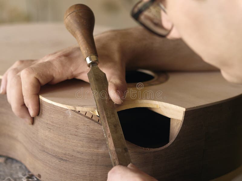 The Process of Making a Cutaway on Classical Guitar. Stock Photo ...