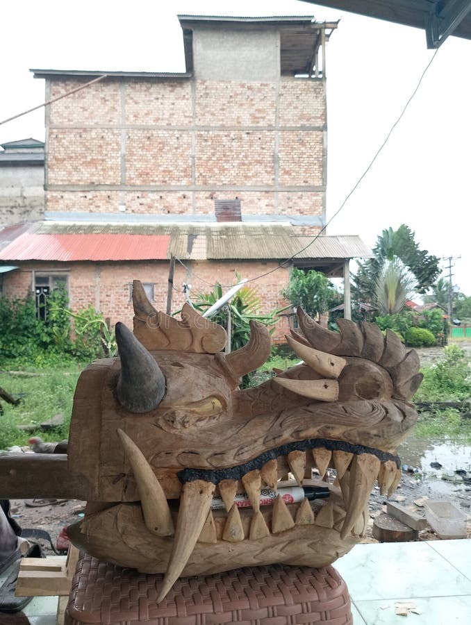 The Process of Making a Dragon Carving from Beautiful Wood Stock Photo ...