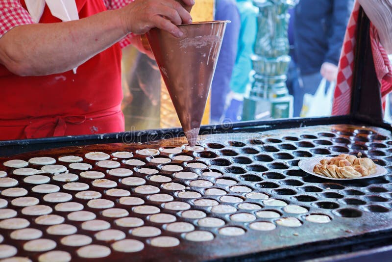 Process of Making Dutch Pancakes Stock Image - Image of iron, baker ...