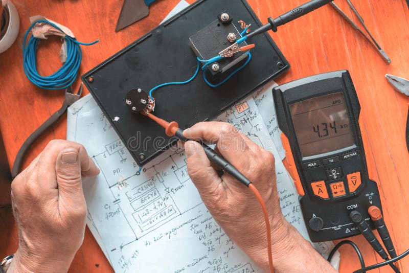 Process of Making Electrical Measurements with Multimeter, Testing the ...