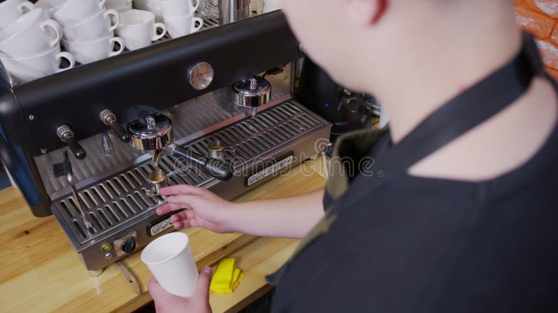 Process of Making Espresso in a Coffee Machine. Barista Making Latte in ...