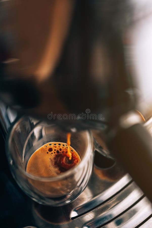 The Process of Making Espresso in the Coffee Machine Stock Photo ...