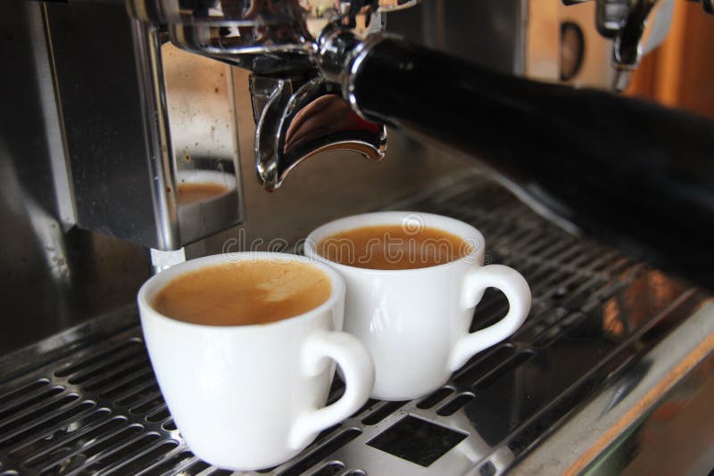 The Process of Making Espresso Coffee Using a Modern Machine Stock ...
