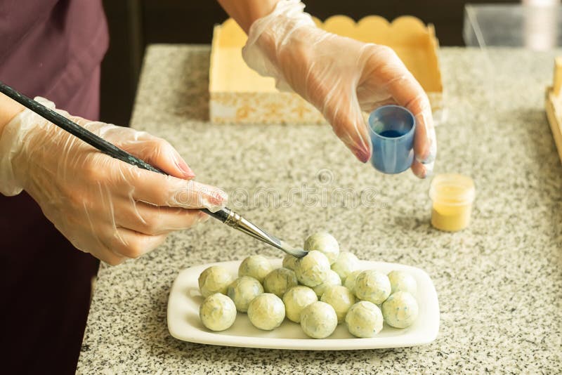The Process of Making Handmade Candies. Chocolatier Brings Candurin on ...