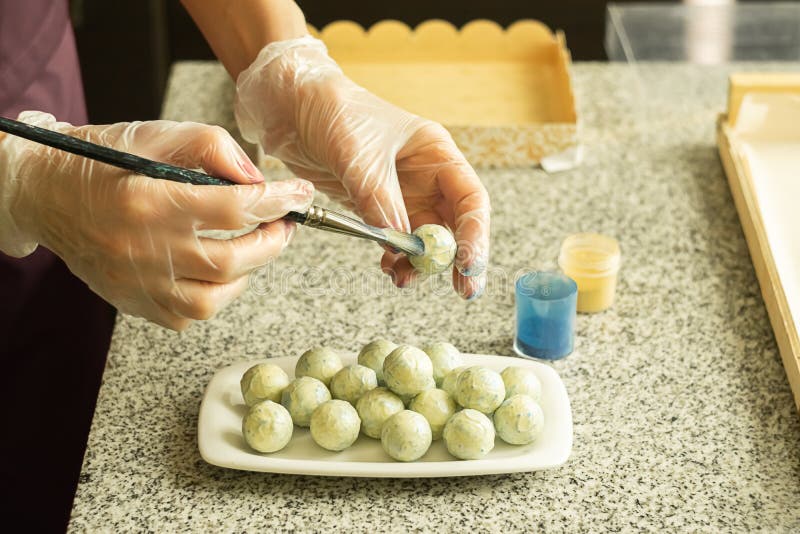 The Process of Making Handmade Candies. Chocolatier Brings Candurin on ...