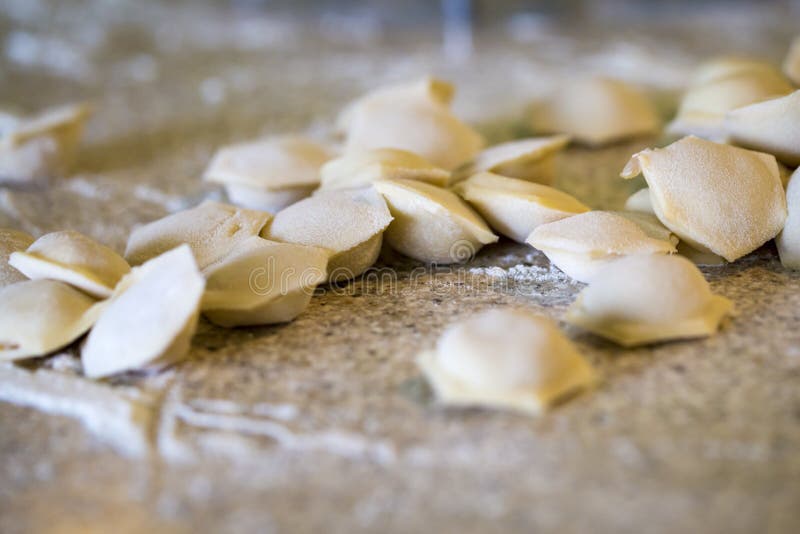 The Process of Making Homemade Dumplings. Ready Raw Dumplings in Flour ...