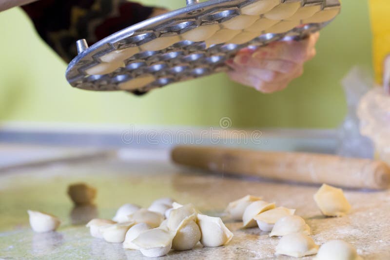 The Process of Making Homemade Dumplings. Ready Raw Dumplings in Flour ...