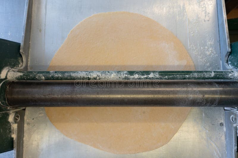 Process of Making Homemade Pasta,Dough Rolling Using an Old Rustic ...