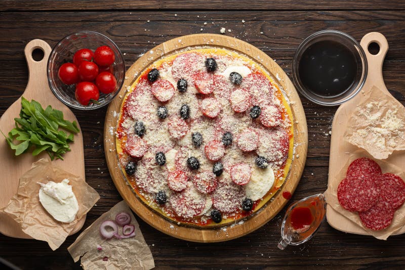 Process of Making Homemade Pizza with Mozzarella Olives and Salami, Top ...