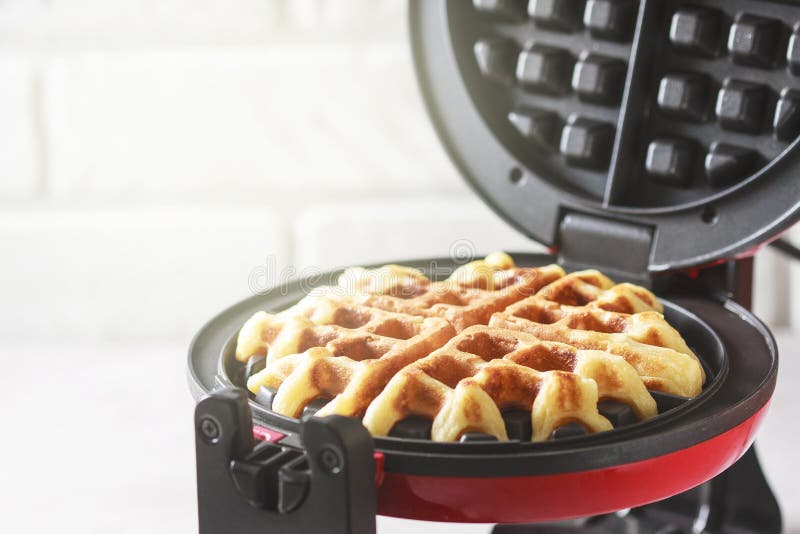 The Process of Making Homemade Waffles. Freshly Baked Waffles in a ...