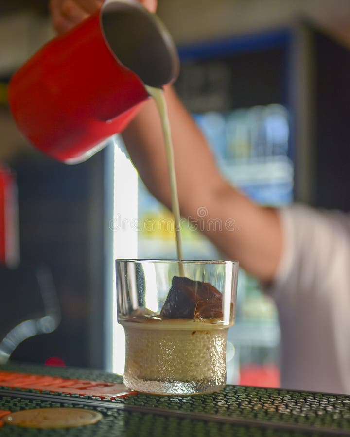 The Process of Making Iced Latte. Cold Summer Coffee Stock Image ...