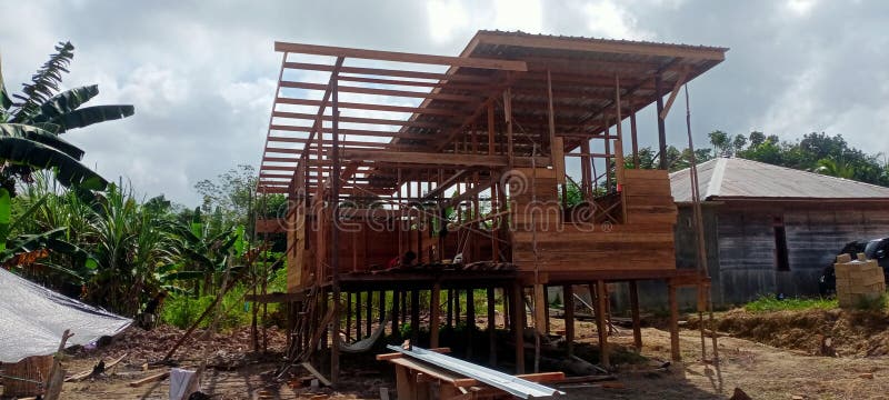 The Process of Making an Ironwood House or Stilt House Stock Photo ...