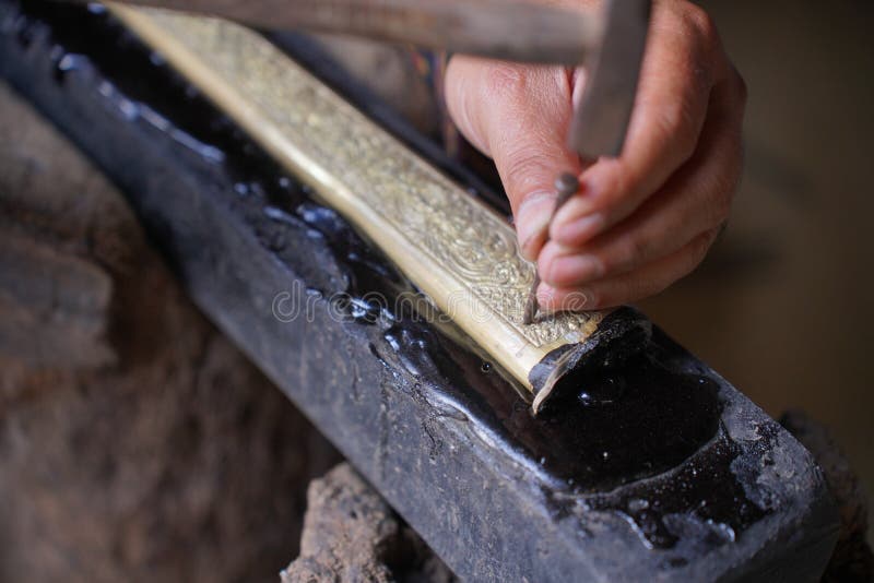 The Process of Making a Keris is Being Carved To Make Traditional ...