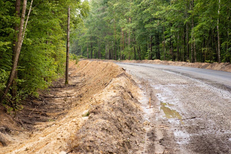 Process of making new road stock photo. Image of building - 264822170