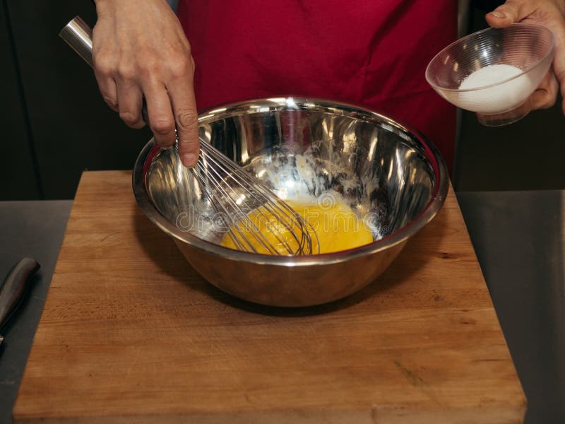The Process of Making Pancakes. Cook in the Kitchen Makes the Dough ...
