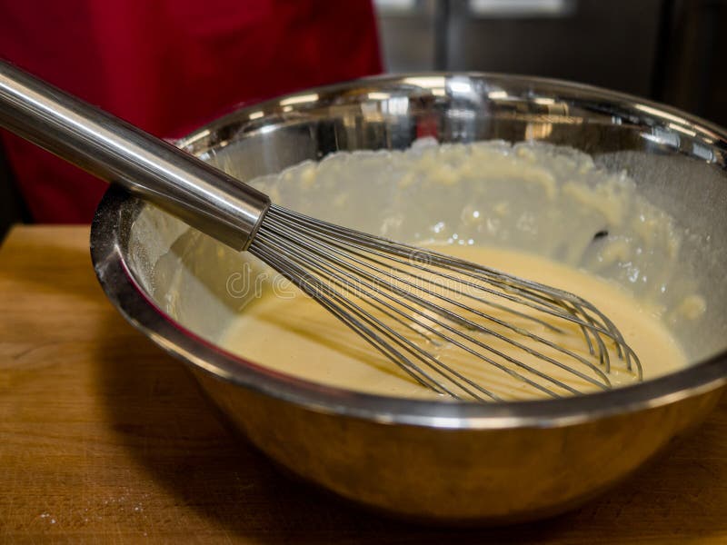 The Process of Making Pancakes. Cook in the Kitchen Makes the Dough ...