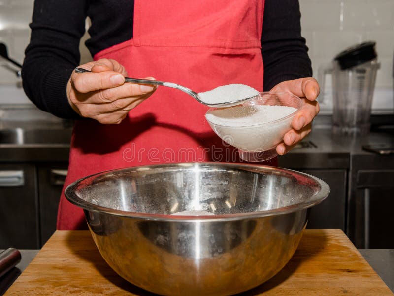 The Process of Making Pancakes. Cook in the Kitchen Makes the Dough ...