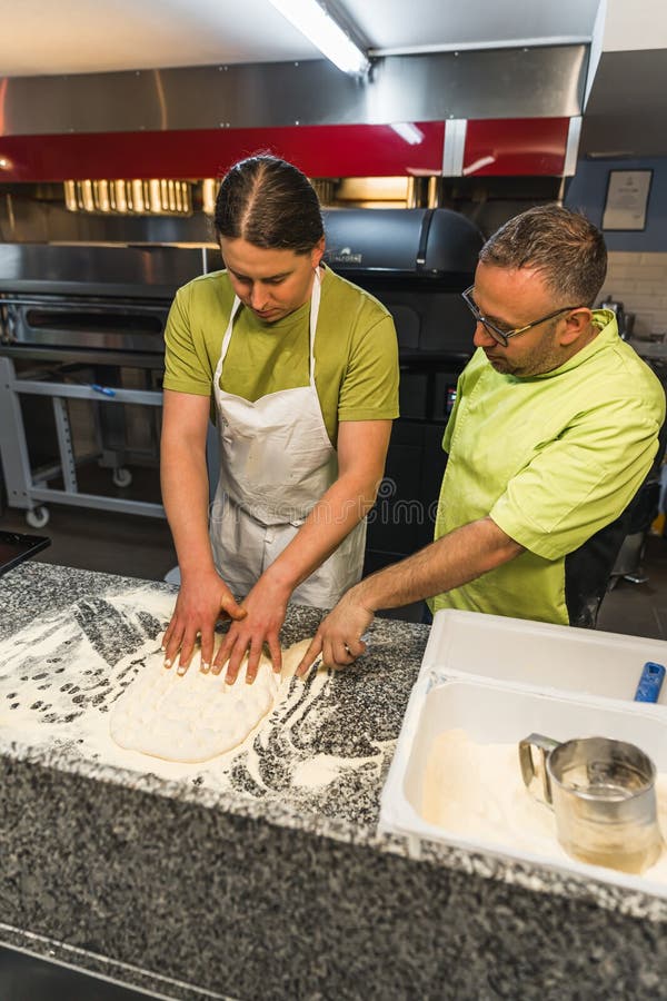 Process of Making Pizza at the Bakery, Two Cooks Stock Photo - Image of ...