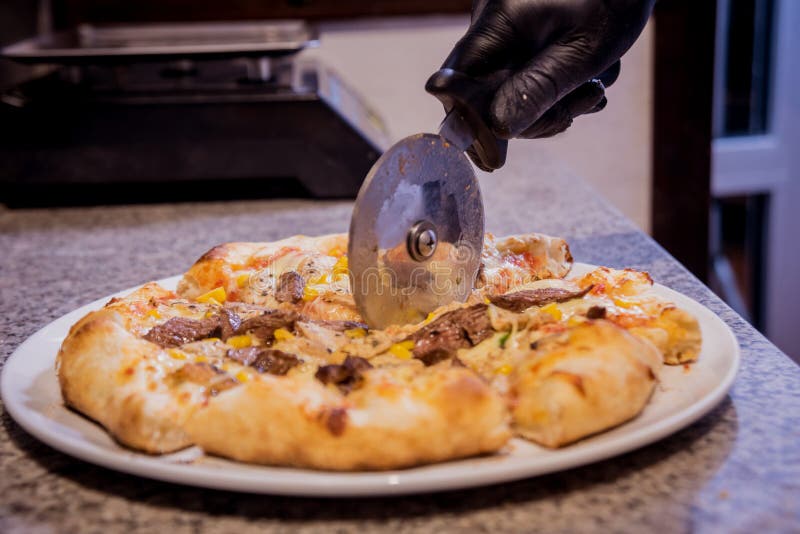 The Process of Making Pizza. Hands of Chef Baker Making Pizza at Cafe ...