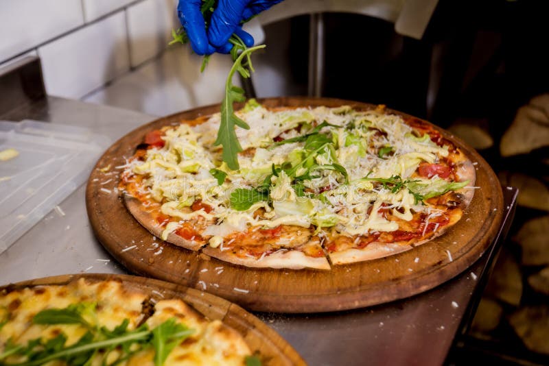 The Process of Making Pizza. Hands of Chef Baker Making Pizza at Cafe ...