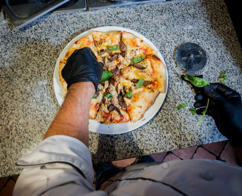 The Process of Making Pizza. Hands of Chef Baker Making Pizza at Cafe ...