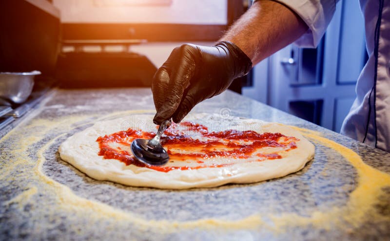 The Process of Making Pizza. Hands of Chef Baker Making Pizza at Cafe ...