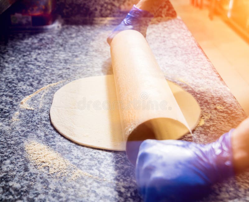 The Process of Making Pizza. Hands of Chef Baker Making Pizza at Cafe ...