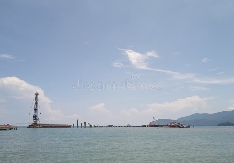 The Process of Making a Port in the Middle of the Sea, and on the Left ...