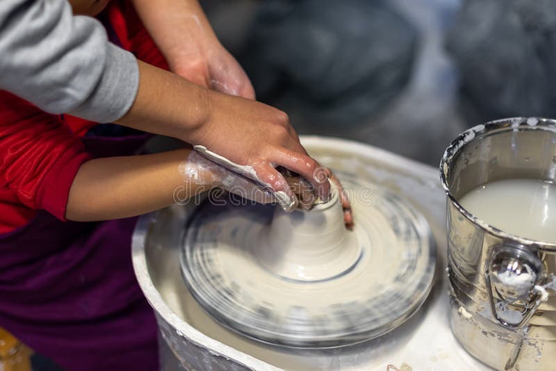 The Process of Making Pottery in a Pottery Workshop Stock Photo - Image ...