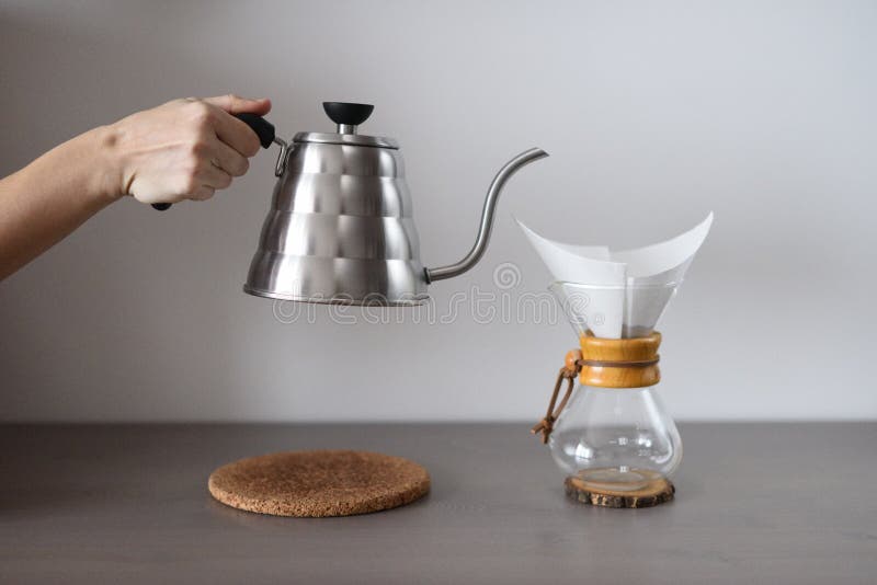 Process of Making Pour Over Coffee. Woman Hand Holding Kettle Over Hand ...