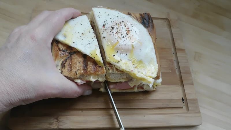 The Process of Making a Sandwich with Ham, Cheese and Egg. Stock ...