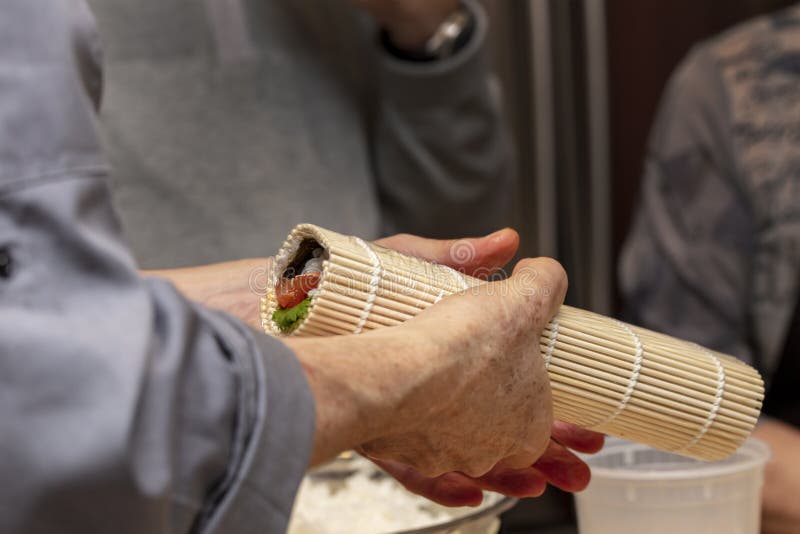 Sushi Roll Being Made in a Demonstaration Class Stock Image - Image of ...
