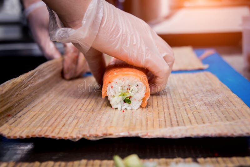 Process of Making Sushi and Rolls at Restaurant Kitchen. Stock Image ...