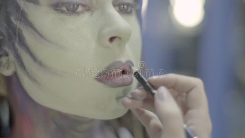 The Process of Making Up Girls Model. Slow Motion. Comic Con Stock ...