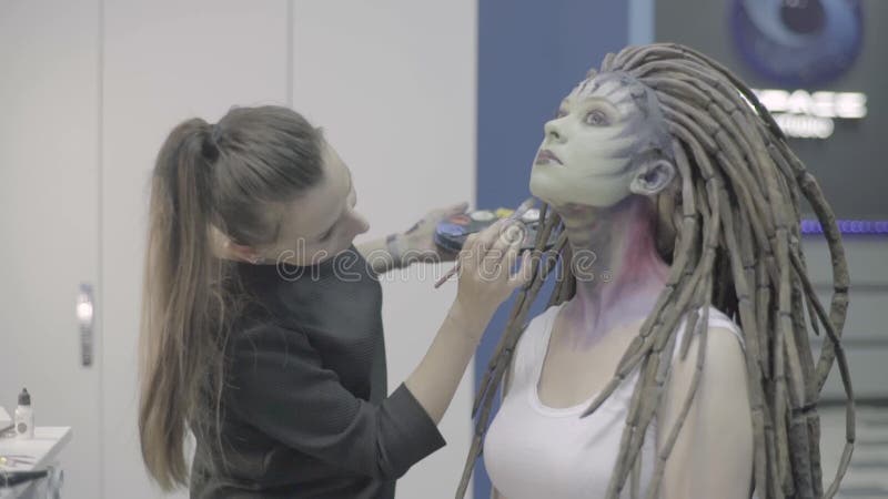 The Process of Making Up Girls Model. Slow Motion. Comic Con Stock ...