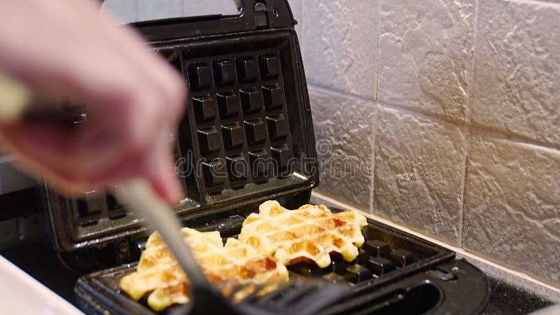 The Process of Making Waffles in an Electric Waffle Iron. Stock Footage ...